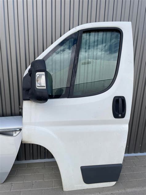 Peugeot Boxer Drzwi lewy przód kompletne EU DOKA 12485124644