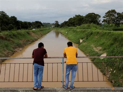 Malaysia Says Firms That Hired Stranded Migrant Workers To Face Action