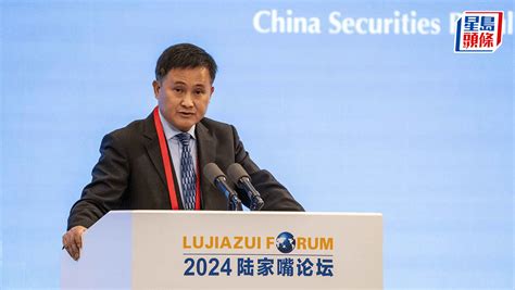 中國貨幣政策將為經濟復甦提供支持 人行潘功勝：增國債買賣不代表搞量化寬鬆