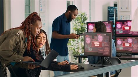 Premium Photo Diverse Group Of Engineers Having Computer Hacked And