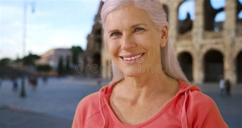 Cute Mature Woman Drinking Tea Or Coffee Lying In Bed In The Morning