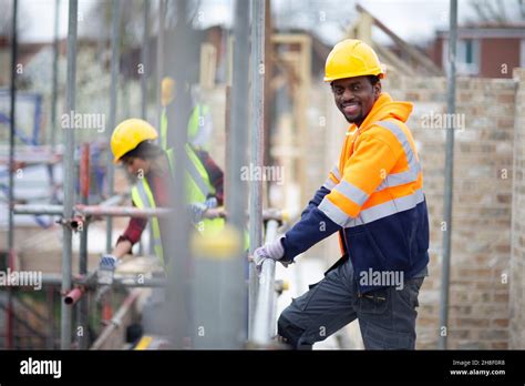 Portrait Confident Male Construction Worker At Construction Site Stock