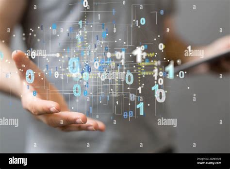 hologram of binary codes on the palm of a businessman digital