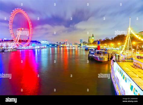View Of The Houses Of Parliament And London Eye Along The River Thames