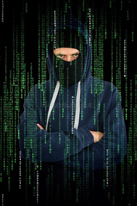 Hacker With Hood Isolated On Black Background With Binary Code In Front