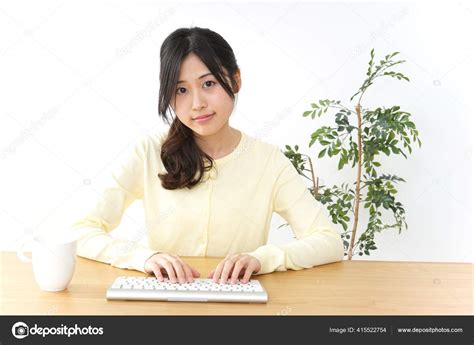 Asian Woman Using Computer Stock Photo Maroke