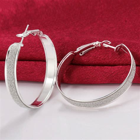 Paparazzi Gala Glitter White Rhinestone Silver Hoop Earrings Earrings