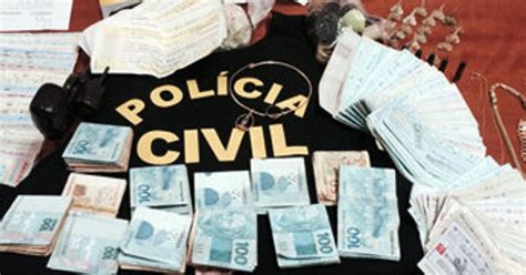 G1 Suspeito De Agiotagem é Preso Com Arma E Mais De R 800 Mil Em Mt