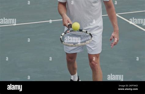 Tennis Player Bouncing Ball On Racket Stock Video Footage Alamy