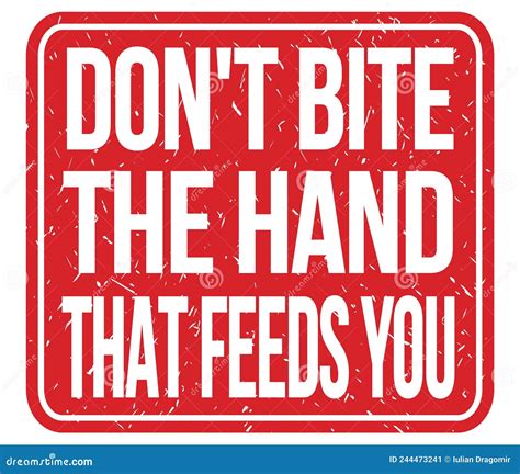 Don`t Bite The Hand That Feeds You Words On Red Stamp Sign Stock