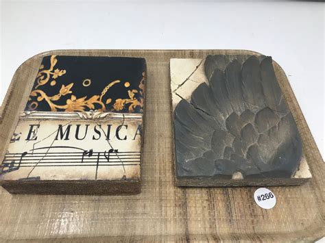 Two Sid Dickens Tiles Auction