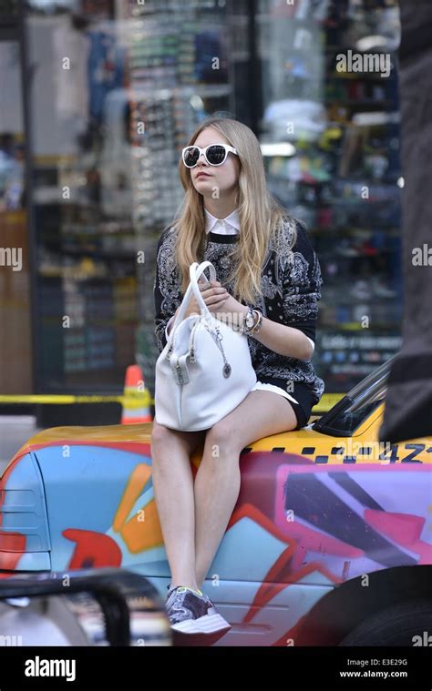 Cara Delevingne Modelling On A Photoshoot For Donna Karans Mainline Fashion Label Dkny