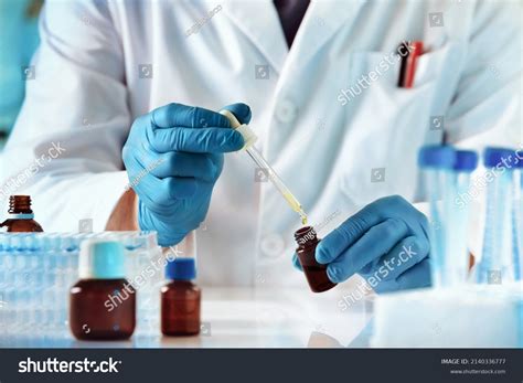 Pharmacist Pipetting Fluids Into Bottle Research Stock Photo 2140336777 Shutterstock