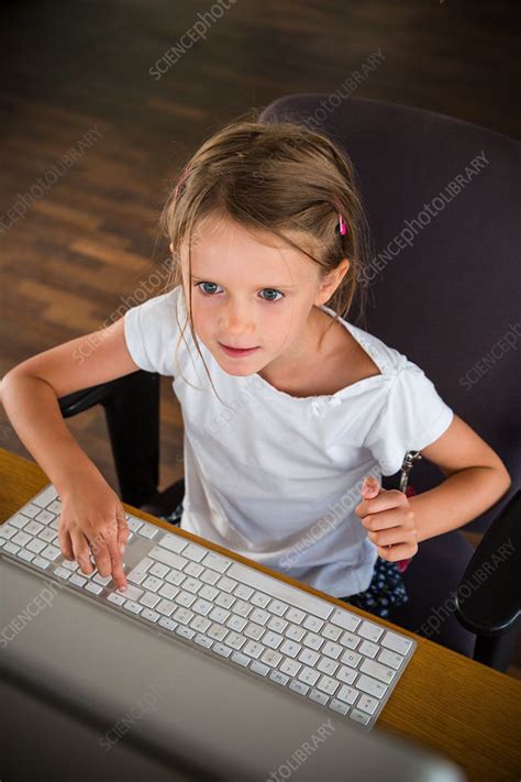 5 Year Old Girl Using A Computer Stock Image C035 1616 Science Photo Library