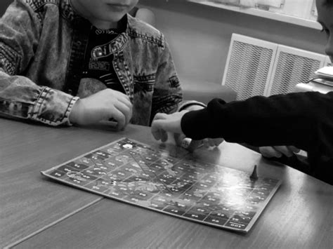 Target Behaviour Fragment A Passes The Die To A Classmate After His