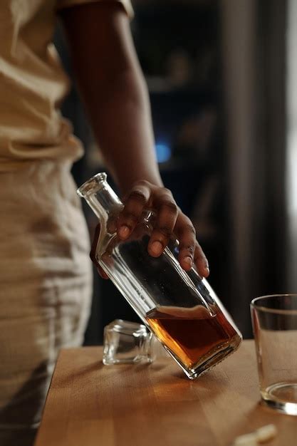 Premium Photo Hand Of Woman Addicted To Alcohol