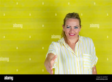 Young Beautiful Woman Wearing Striped Shirt Standing Over Isolated