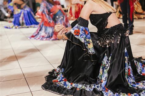 Premium Photo Beautiful Gypsy Girls Dancing In Traditional Colorful