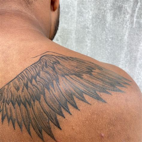 Angel Wings Tattoo On Shoulder Blade