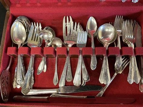 2 Or More Patterns Of Silverware In Case Legacy Auction Company