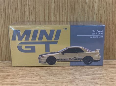 Mini GT 1 64 Top Secret Nissan Skyline GT R VR32 Top Secret Gold