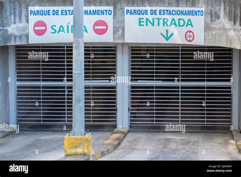 The Entry And Exit Signs For Vehicles To An Underground Car Park Stock Photo Alamy