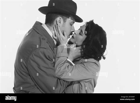 Portrait Of Happy Young Couple Man And Woman In Retro Styled Clothes