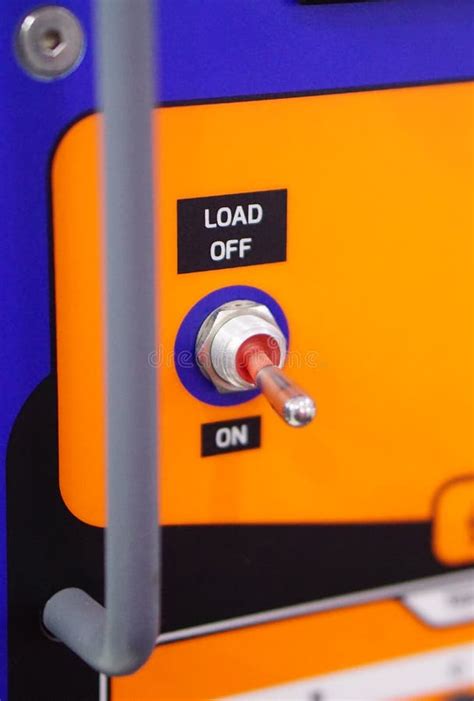 Closeup Of Load On And Off Switch On Panel Board In An Industry Stock Photo Image Of Machine
