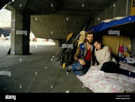 Young Homeless Couple In Shelter Under The Southbank Complex London