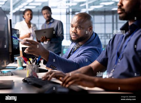 Teamworking Engineers In Data Center Using Diagnostic Tools And System