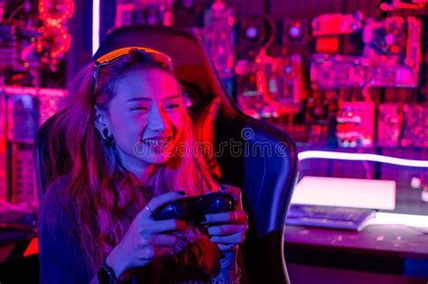 Gamer Using Joystick Controller For Virtual Tournament Plays Online