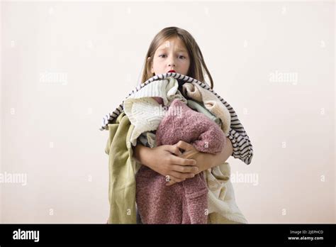 Recycling Concept Year Old Girl Organizing Her Clothes To Reuse