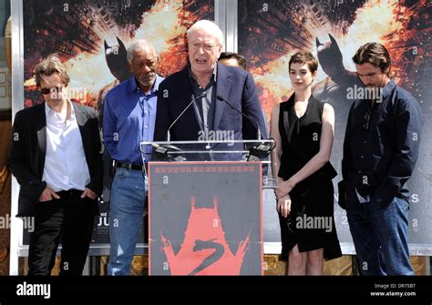 Michael Caine Hand And Foot Print Ceremony Honoring Christopher Nolan Held At Grauman S Chinese