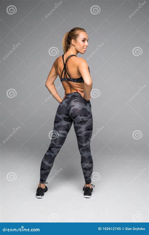 Rear View Shot Of A Healthy Young Woman In Sportswear Full Length