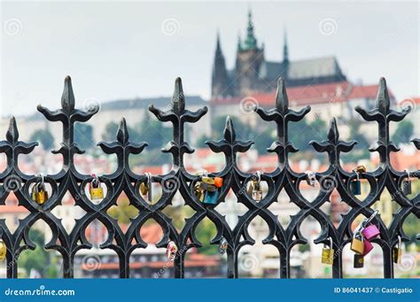 Metal Fence With Padlocks Prague Castle In The Background Editorial