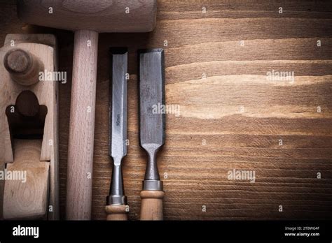 Wooden Hammer Shaving Plane Flat Chisels On Wood Board Construction Concept Stock Photo Alamy