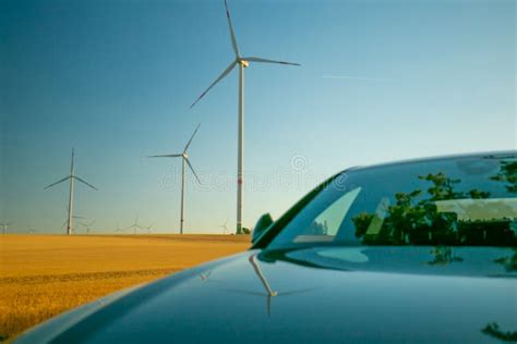 Wind Generators And Electric Car In The Field And Electric Car Alternative Energy For Cars Wind