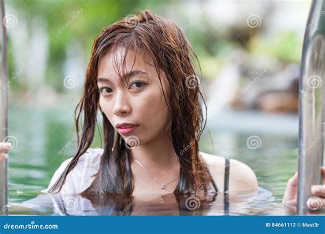 Asian Woman In Hotel Swimming Pool Relaxing Vacation Travel Young Girl