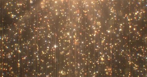 Beautiful Gold Glitter Particle Rain Falling Shimmers Sparkle Light