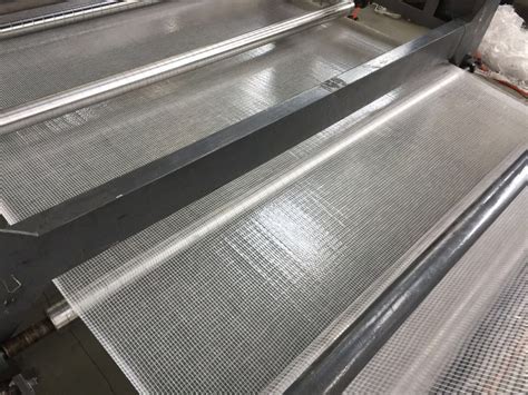 全新粒料白色网格布 透明PE夹网布 阿里巴巴