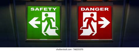 Emergency Exit Sign Shows Direction Escape Stock Photo 1355377535 Shutterstock
