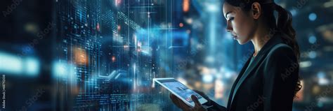 Modern Woman Interfacing With Tablet In Futuristic Setting Stock Photo Adobe Stock