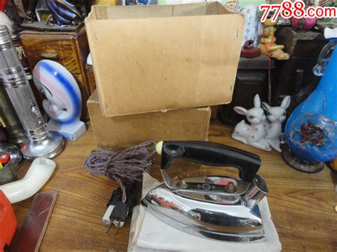 上世纪70 80年代中国制造山东莱阳牌老式电熨斗民俗老电器通电有反应正常使用。熨斗烫斗种类图片收藏价格7788茶具