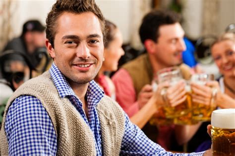 Premium Photo Man Drinking Beer In Bavarian Pub
