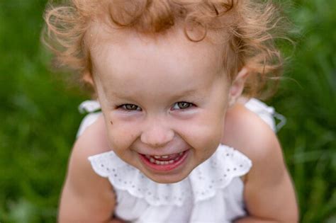 Premium Photo Portrait Of Smiling Cute Girl