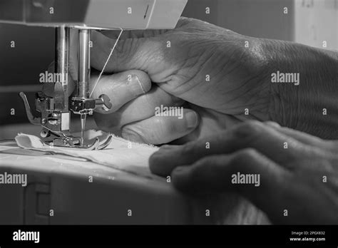 Sewing Machine And Old Grandmother S Hand Stock Photo Alamy