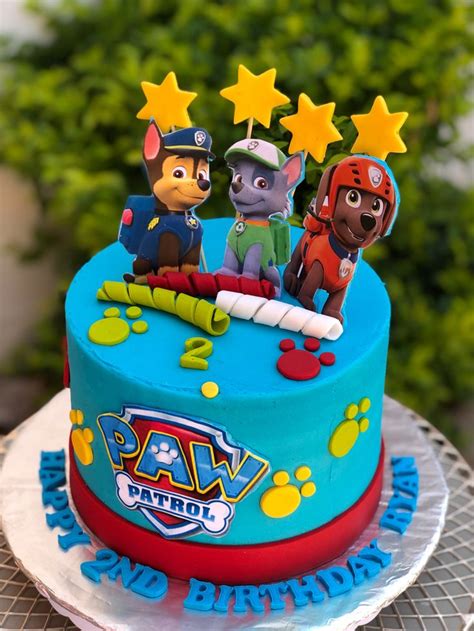A Birthday Cake With Paw Patrol Characters On It