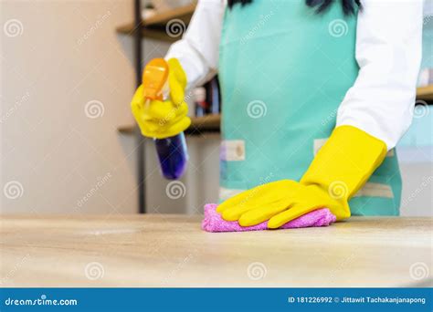Maid Service In The Hotel Room Cleaning Of Hotel Rooms A Girl In