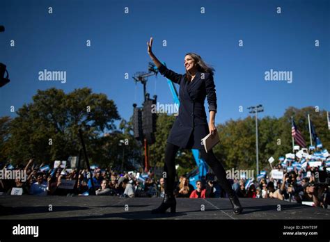 Rep Alexandria Ocasio Cortez D Ny Waves To The Crowd As She Arrives