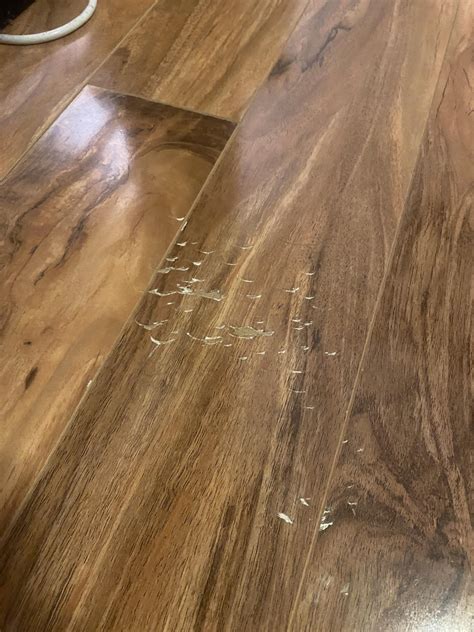 Help We Didnt Realise That The Centre Supports Of Our Bed Had Chipped The Laminate Floor Is